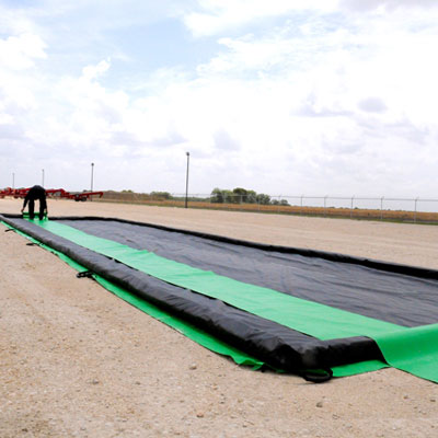 Berm Protection Ground Tarps & Track Belts | Protects Spill Berms